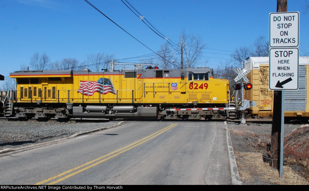 UP 8249 is the trailing unit on NS 11J passing by the Valley Rd grade crossing